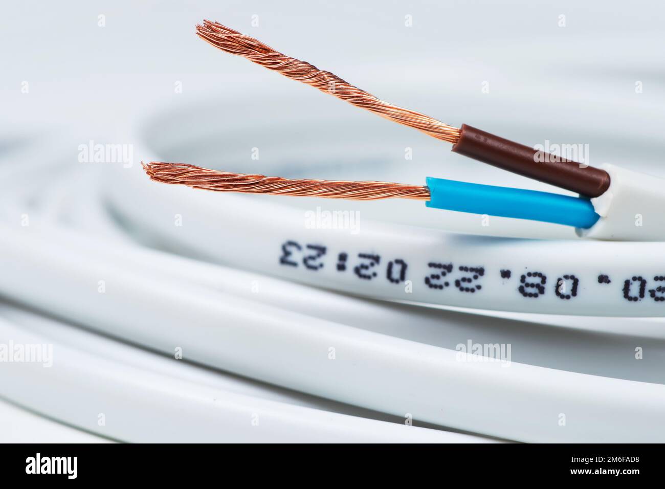 closeup of a electric cable on a white background Stock Photo - Alamy