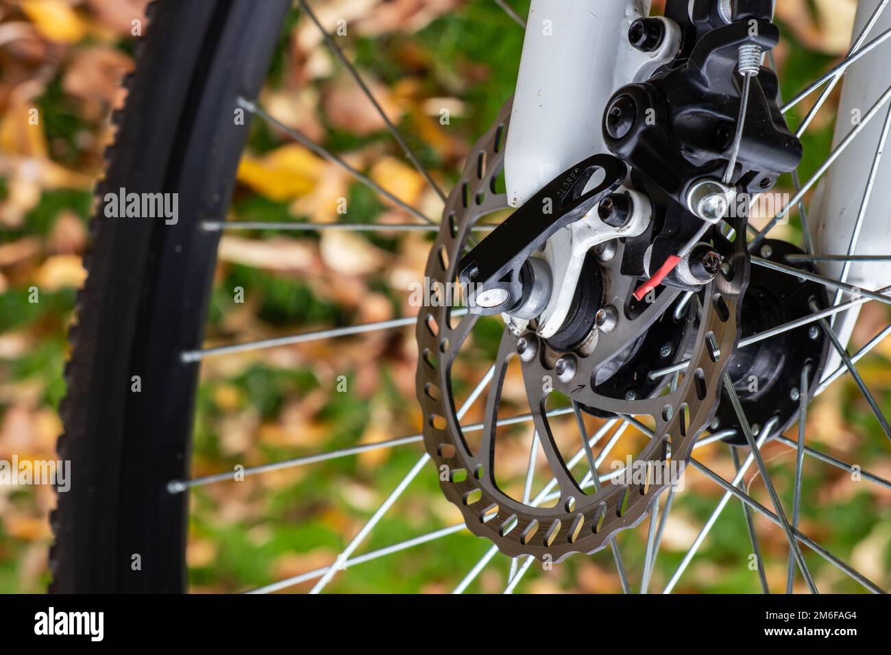Bicycle disk brake rotor in focus close up Stock Photo - Alamy