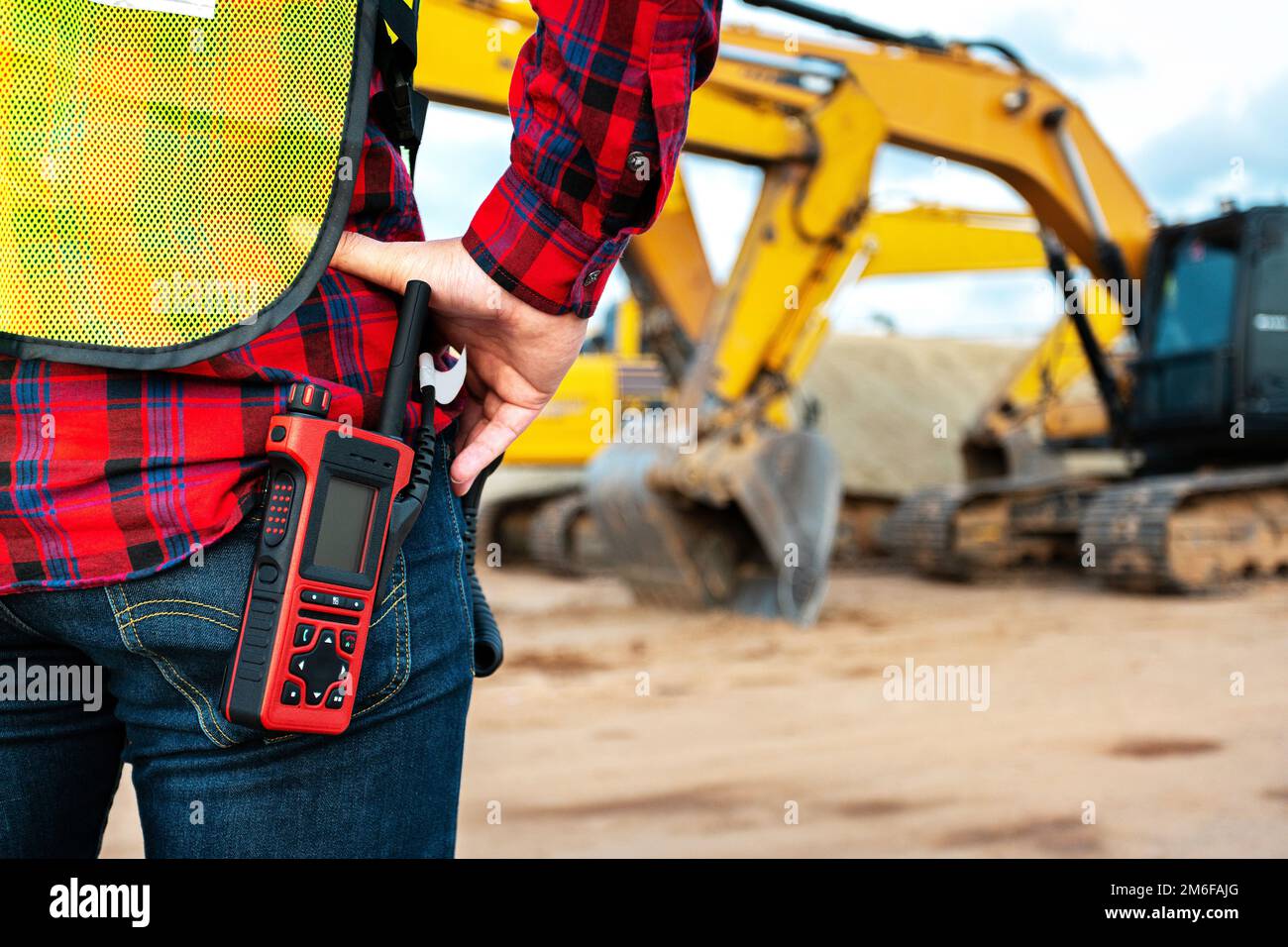 asian technician civil engineer talk with team by walkie talkie and ...