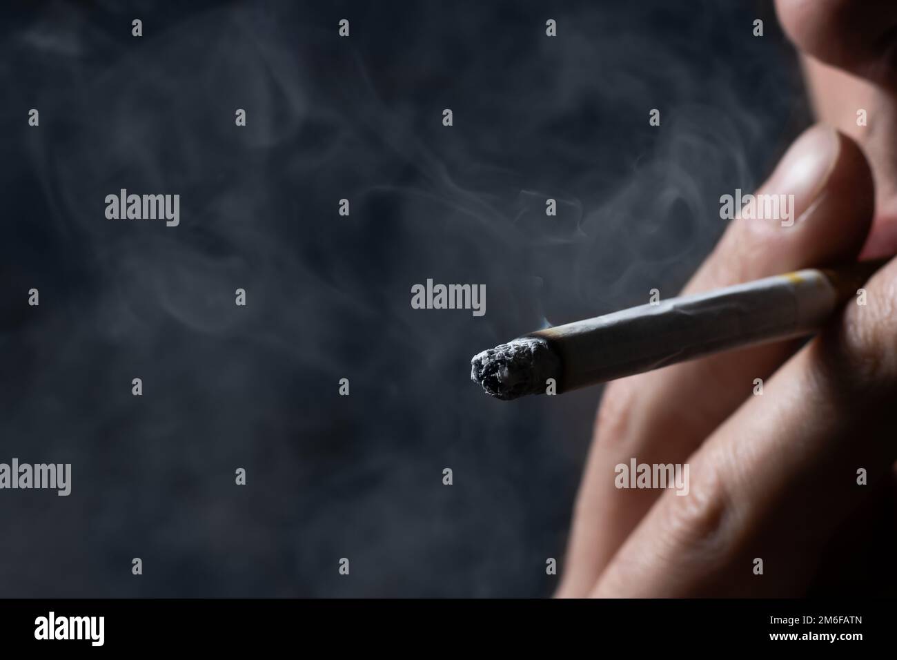 Vietnamese man smoking tobacco hi-res stock photography and images - Alamy