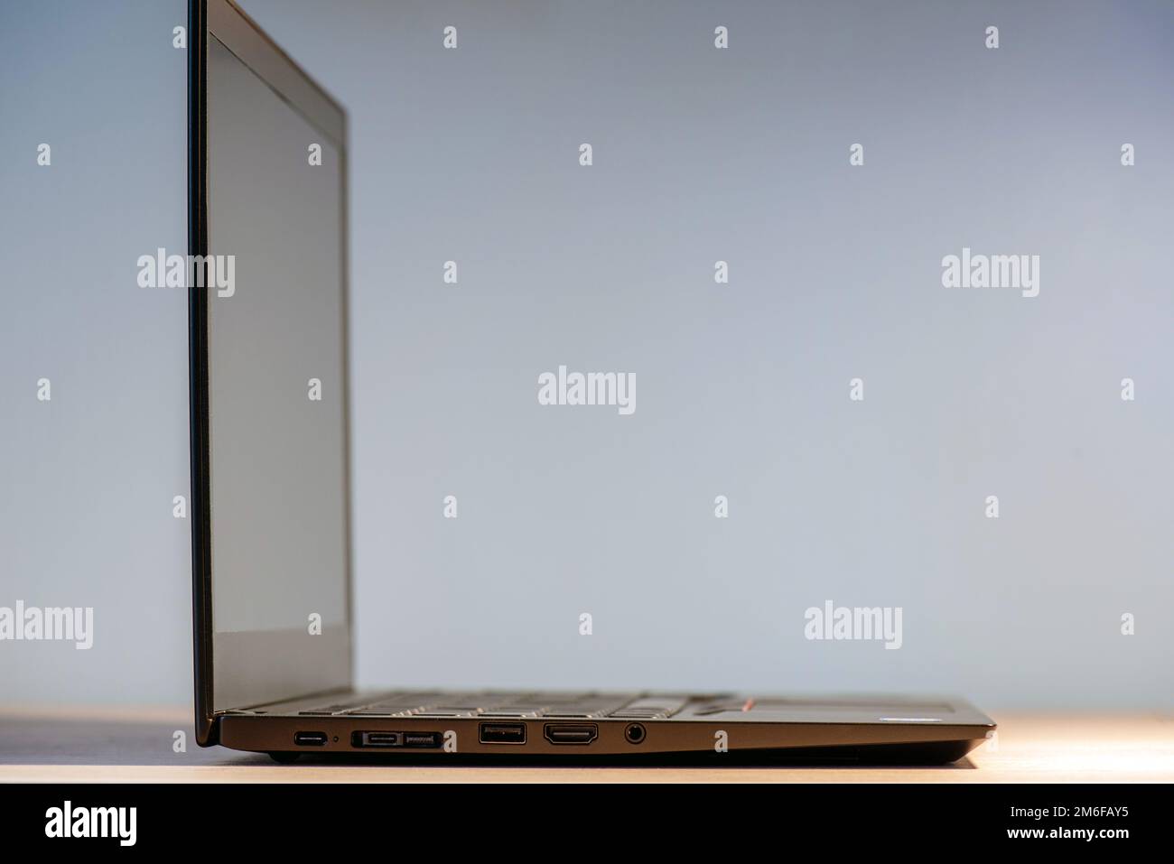 Side view to the slim laptop Stock Photo - Alamy