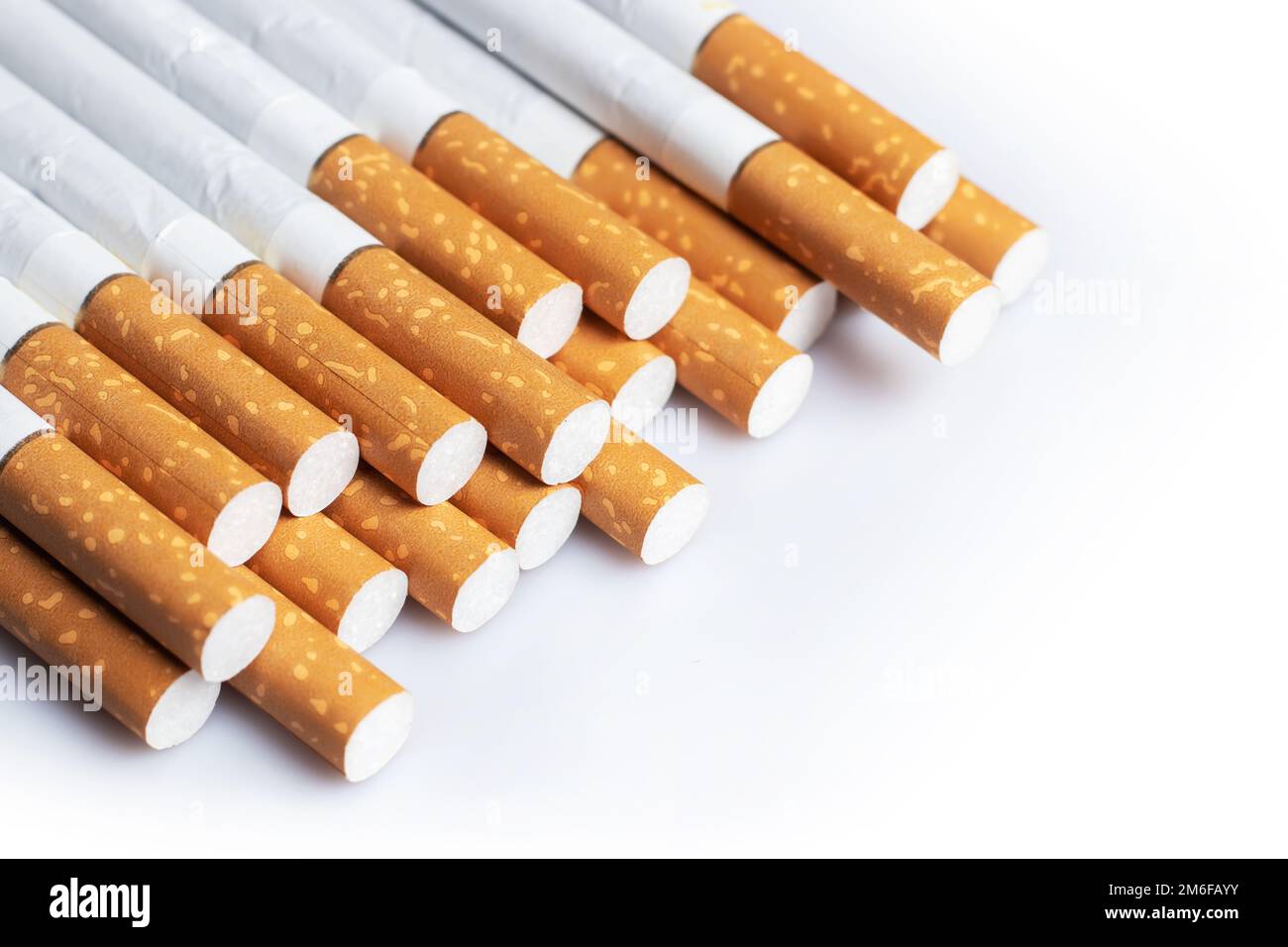 Many cigarettes stacked together. Drugs are harmful to the respiratory ...