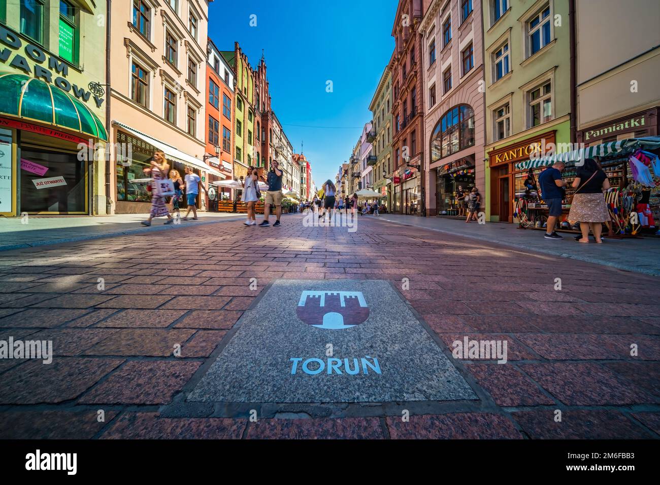 Torun city emblem sign on the pavement in Old Town Stock Photo - Alamy