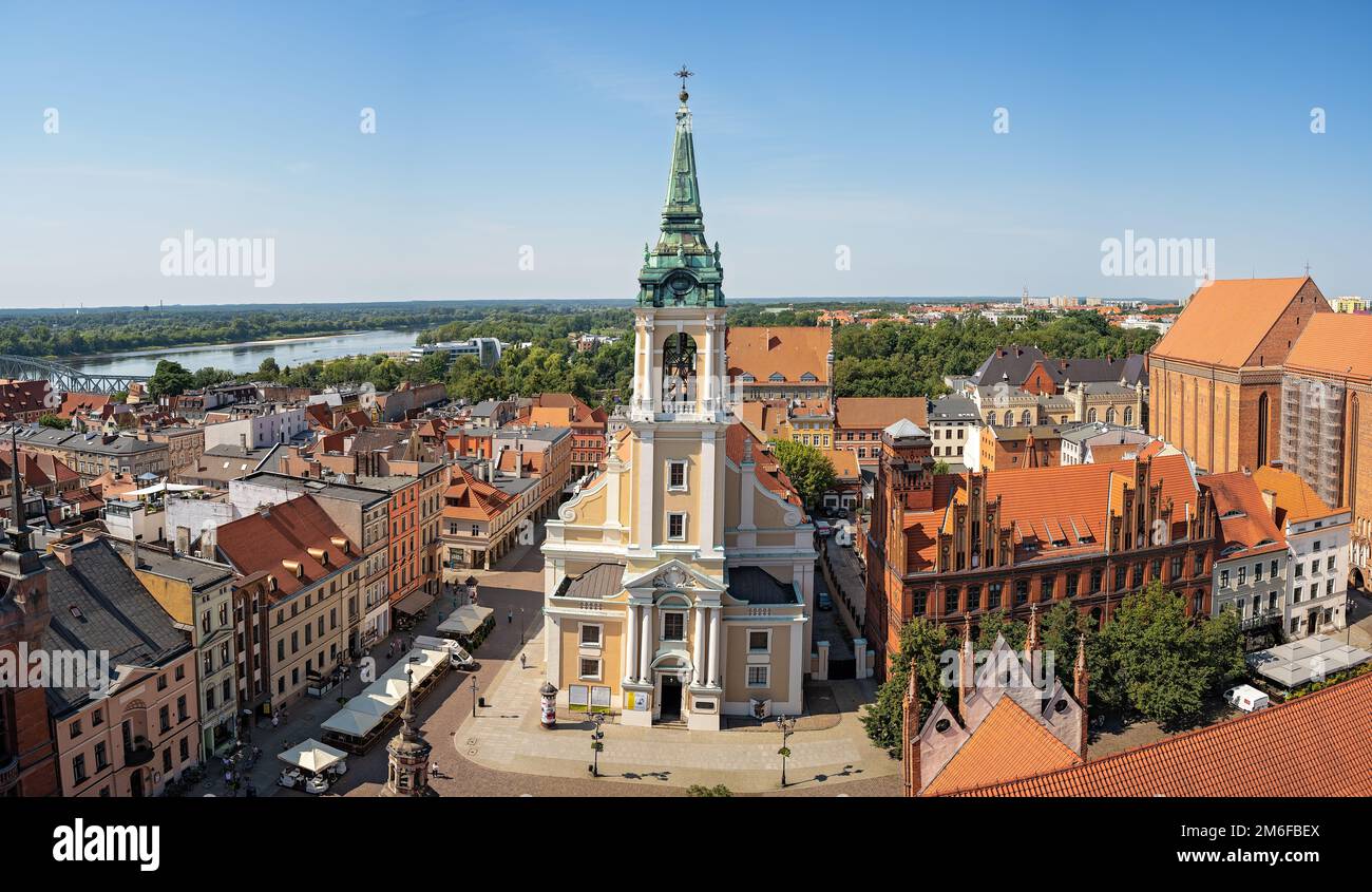 Church of the Holy Spirit surrounded by buildings in Torun Stock Photo ...