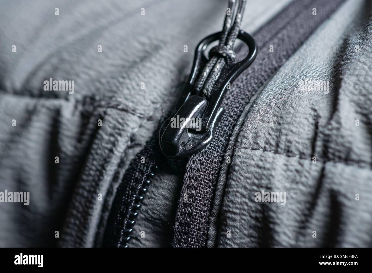 Iron zipper close up view, needlework concept Stock Photo - Alamy