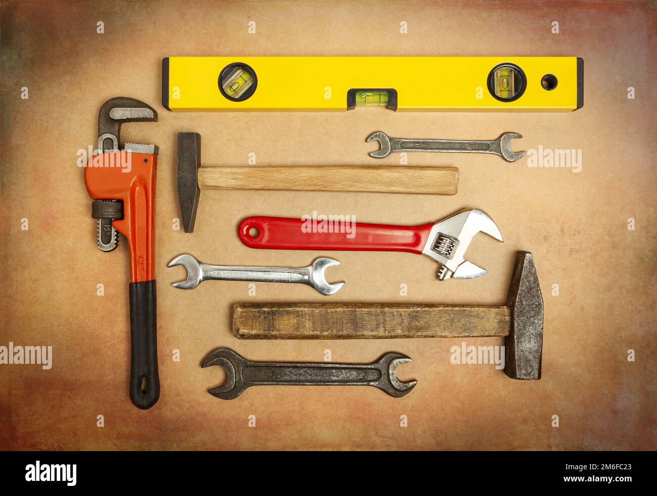 Various tools to work with, hammer, spanner, gas wrench, level to ...