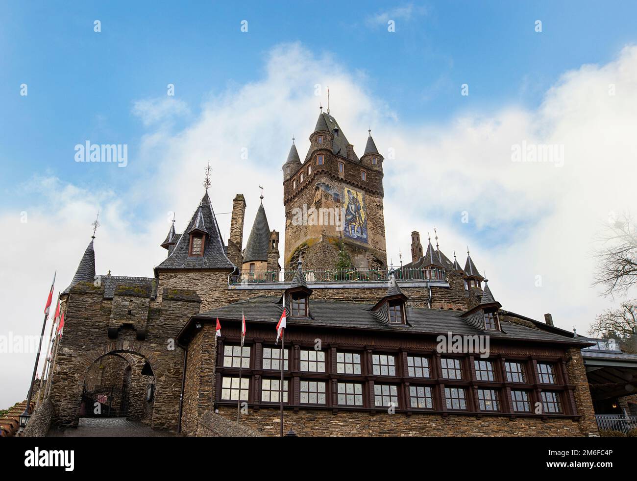 Gate of Reichsburg Castle, which rises on the hill above the Moselle ...
