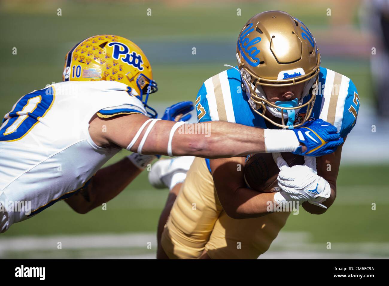UCLA Bruins wide receiver Logan Loya (17) leaps towards the end zone ...