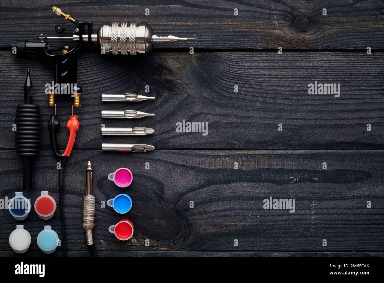 Tattoo machine, tools and supplies Stock Photo - Alamy