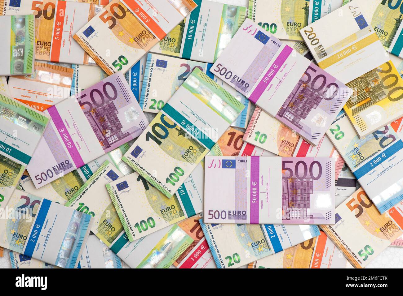Bundles of many Euro banknotes Stock Photo - Alamy