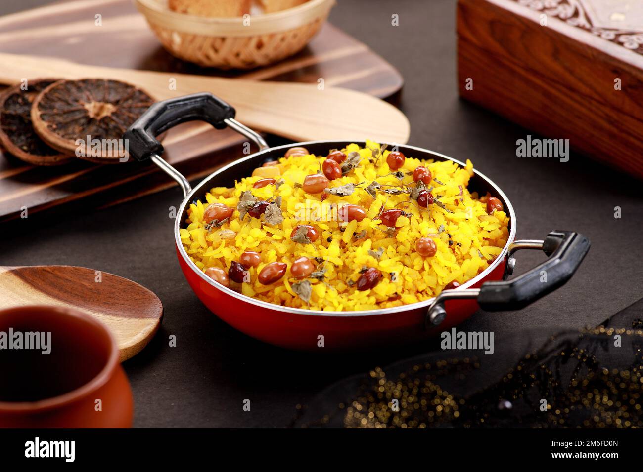 Indian Food Poha with Peanuts in a Wok Stock Photo - Alamy