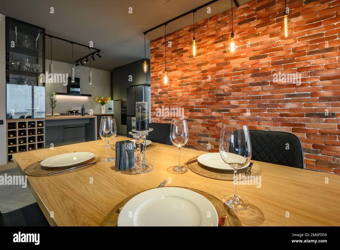 Modern luxurious dark gray and black kitchen with dining table Stock ...