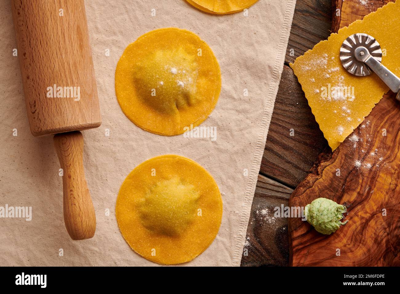 Raw homemade ravioli pasta with spinach and ricotta Stock Photo - Alamy