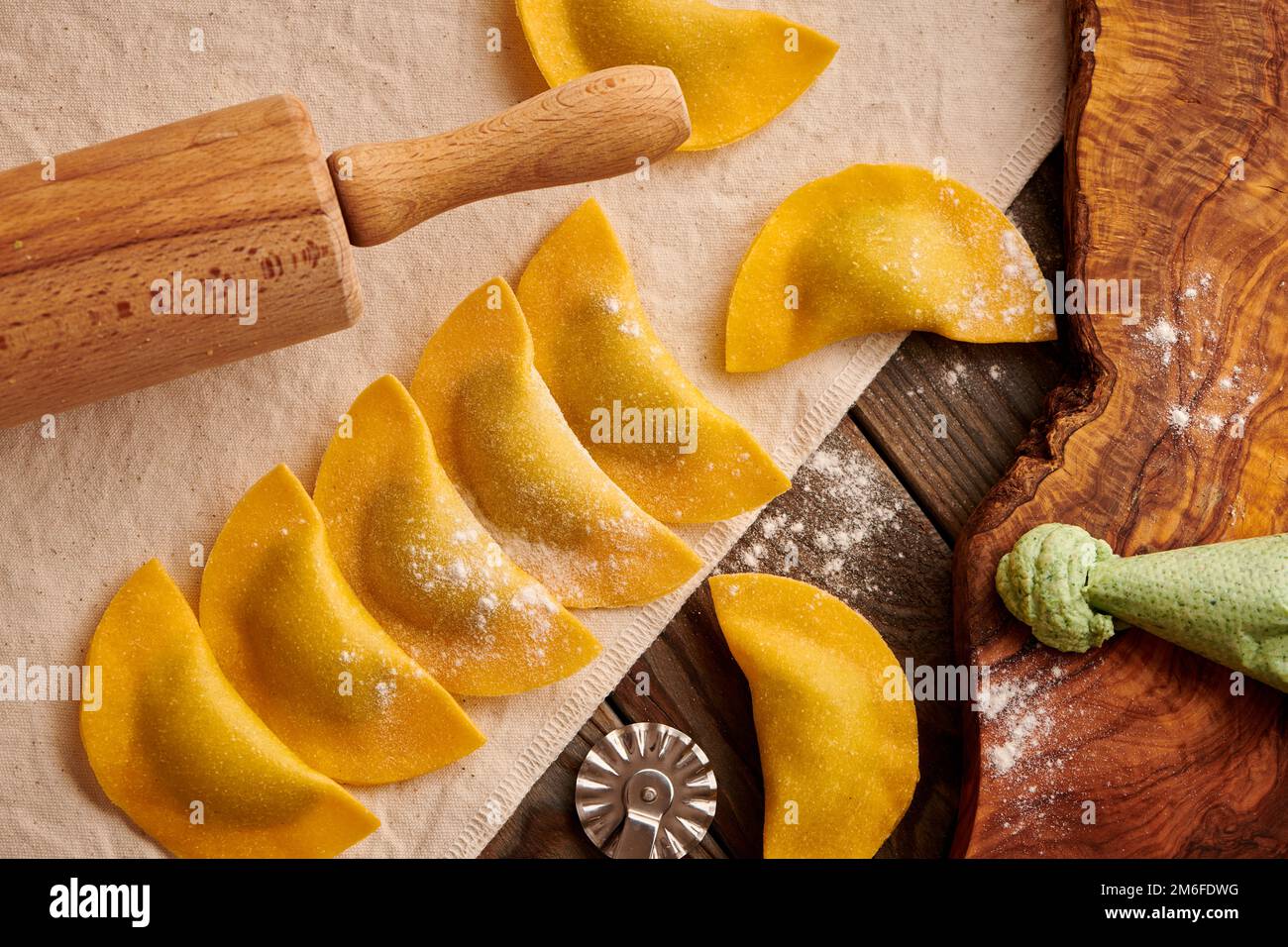 Raw homemade ravioli pasta with spinach and ricotta Stock Photo - Alamy