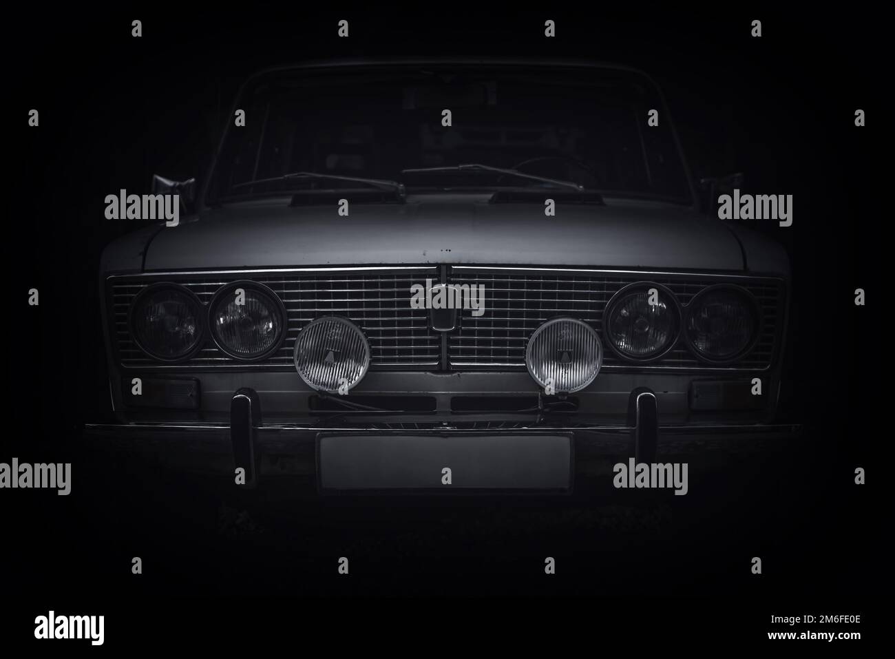 Front view of an old Russian car. Front view of radiator grill and ...