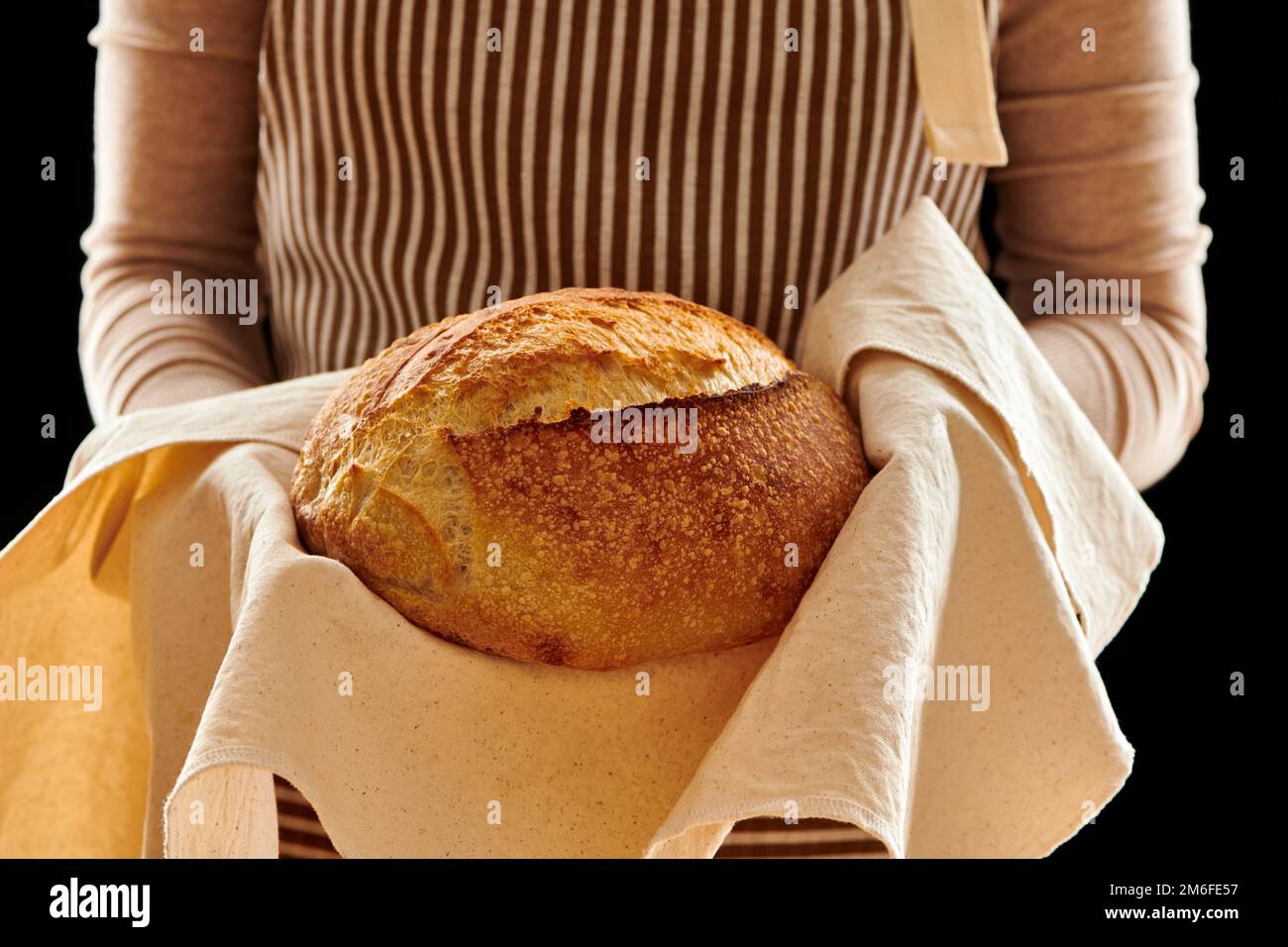 Woman holding bread bakery hi-res stock photography and images - Alamy