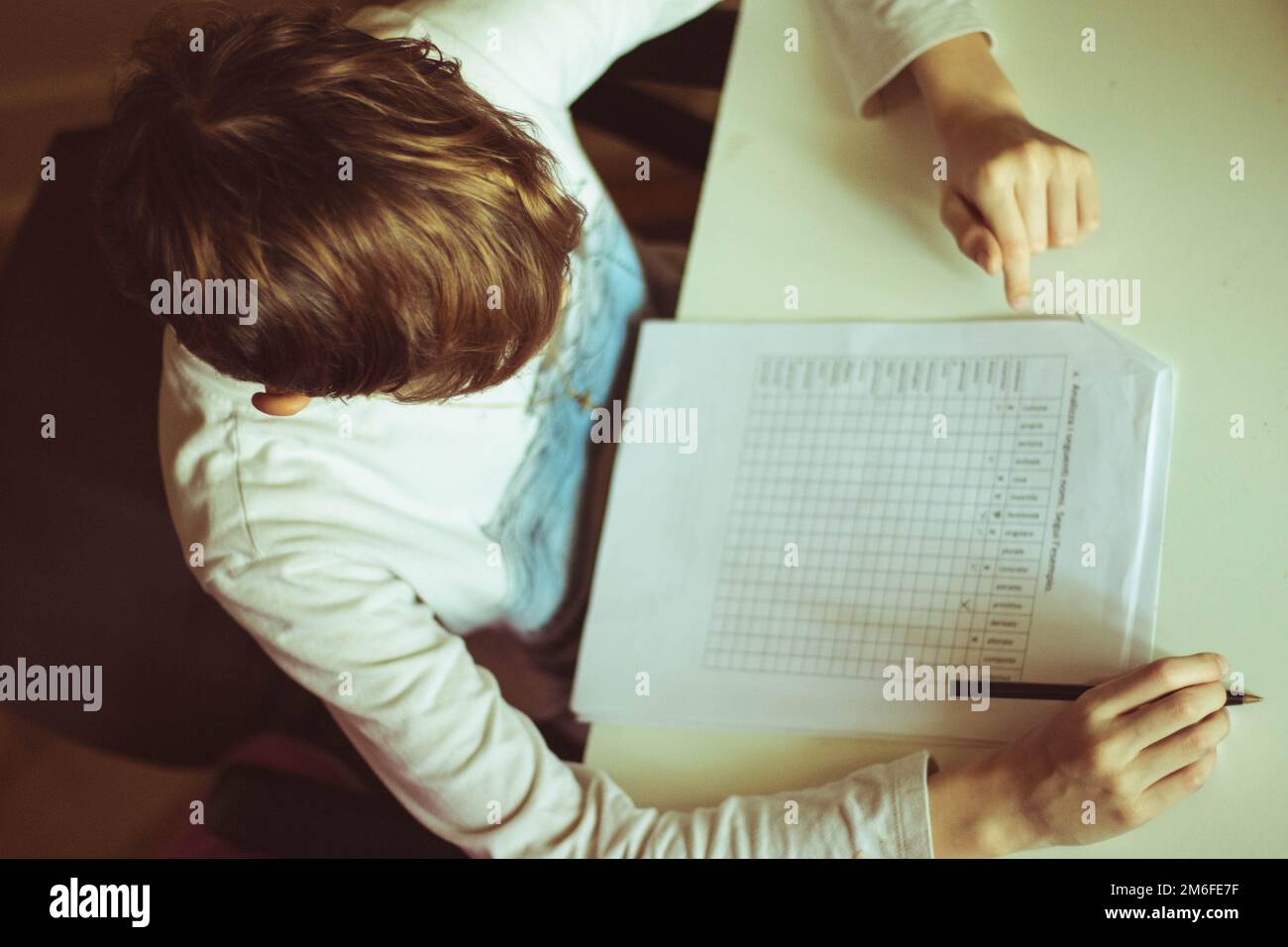 Child studying and doing homework in Italy 2021 Stock Photo - Alamy