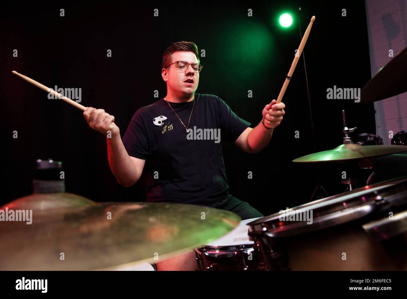 Idles drummer Jon Beavis photographed at Factory Studios, Bristol Stock ...
