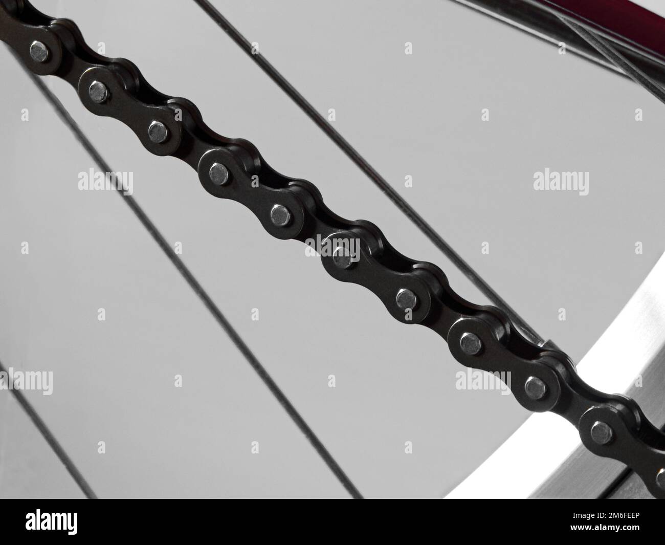 Single speed bike chain. Close-up. On white background Stock Photo - Alamy
