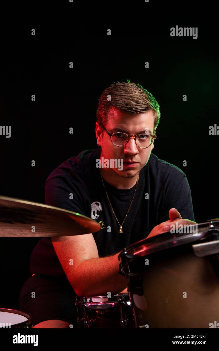 Idles drummer Jon Beavis photographed at Factory Studios, Bristol Stock ...