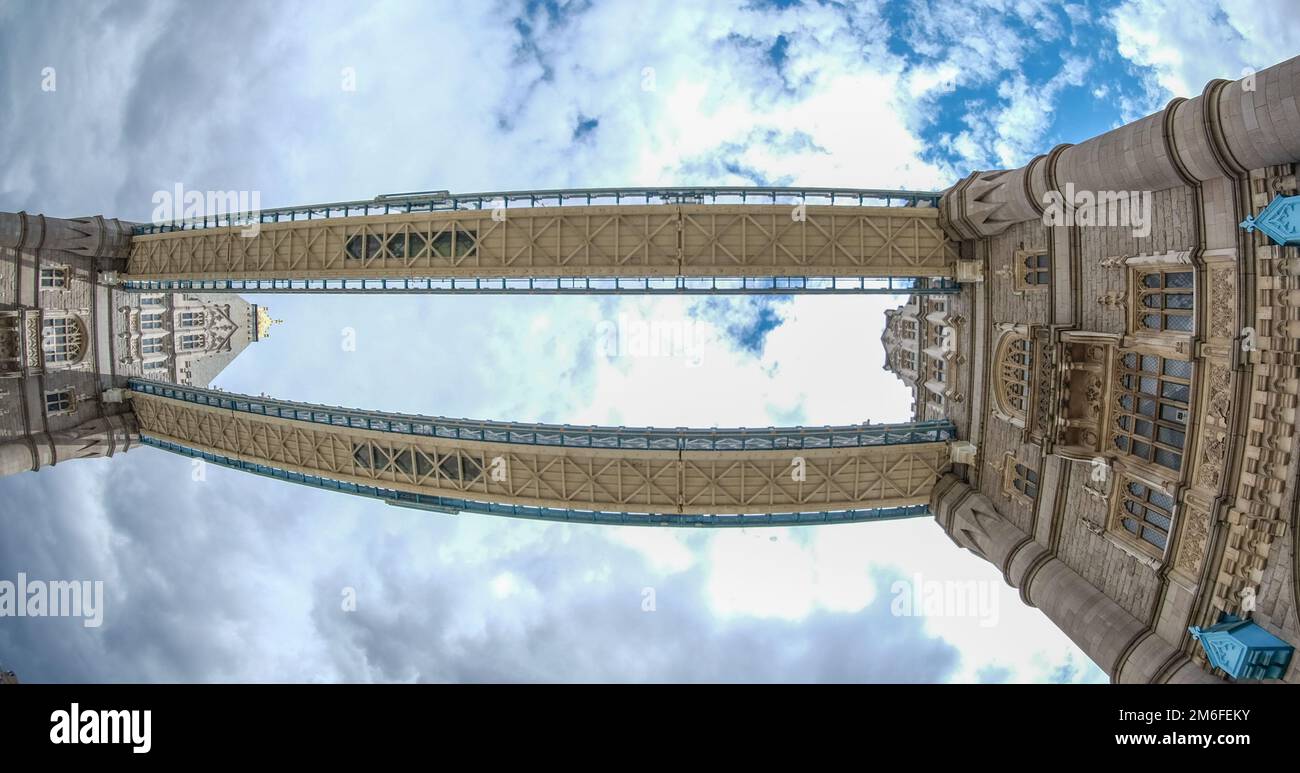 A low angle view of the Tower Bridge in London connecting two medieval ...