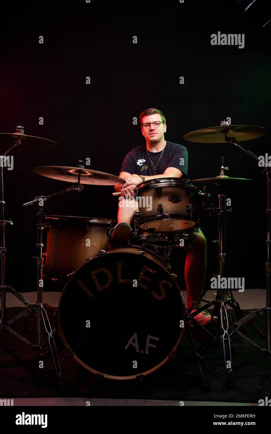 Idles drummer Jon Beavis photographed at Factory Studios, Bristol Stock ...