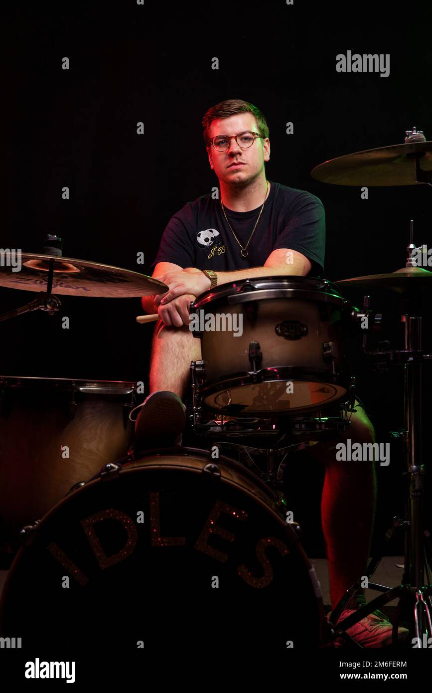 Idles drummer Jon Beavis photographed at Factory Studios, Bristol Stock ...