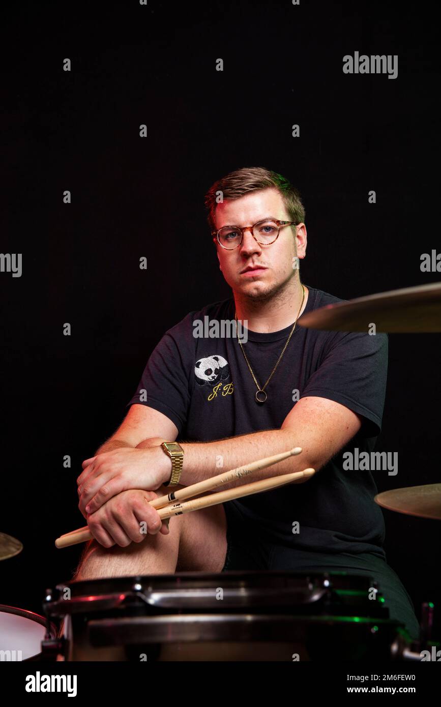 Idles drummer Jon Beavis photographed at Factory Studios, Bristol Stock ...