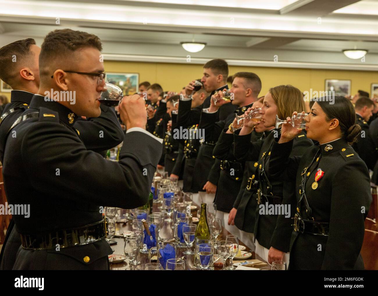U.S. Marine Corps officers, along with special guests, take part in ...