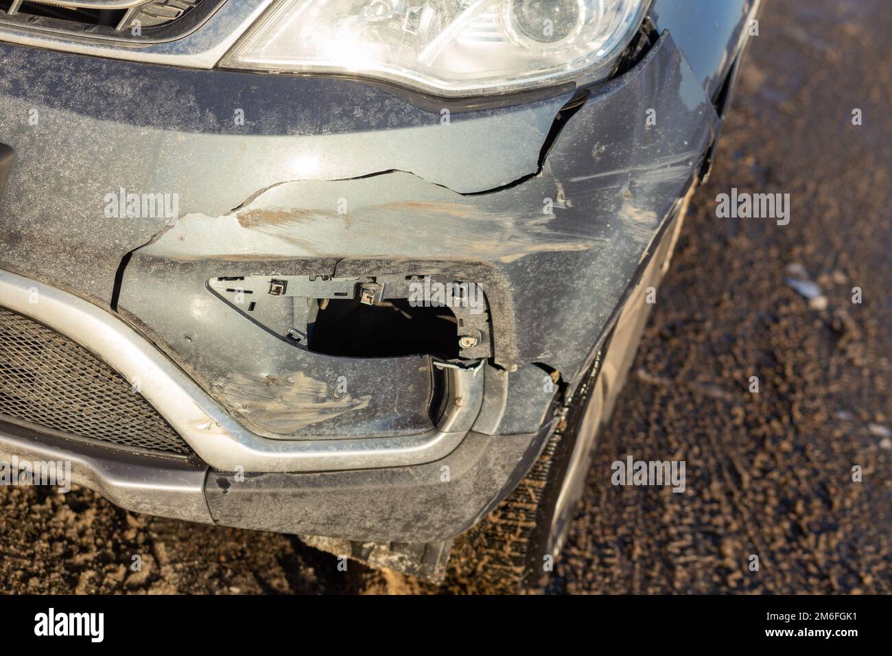 Front of gray crossover car get damaged by crash accident on the road ...
