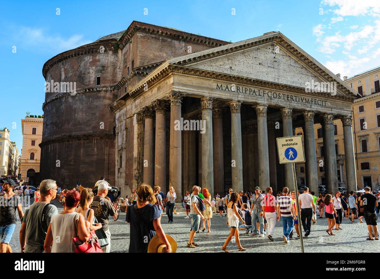 Ancient pantheon exterior daytime with crowded square in Rome, Italy ...