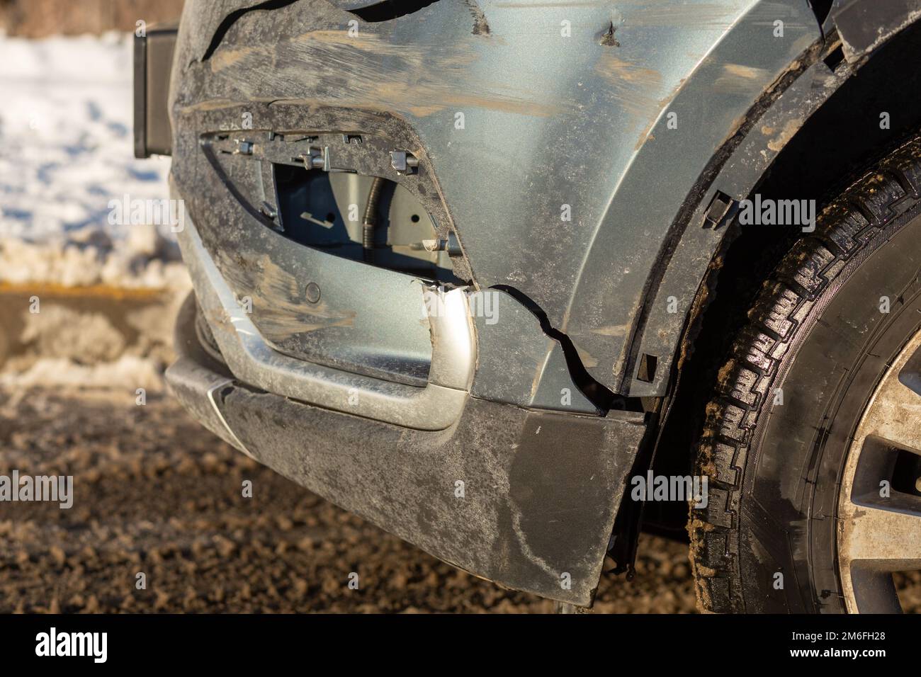 Front of gray crossover car get damaged by crash accident on the road ...