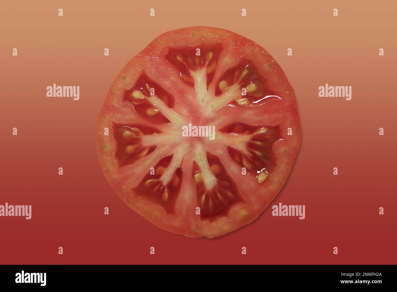 Red tomato over matching colour background Stock Photo - Alamy