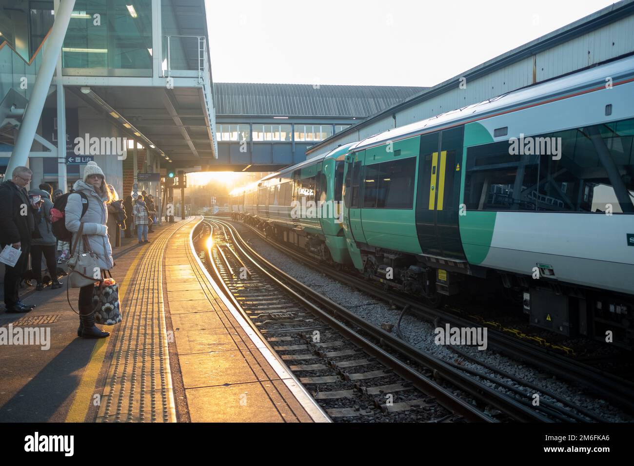 London-December 2022: Southern Train aClapham Junction Station platform ...