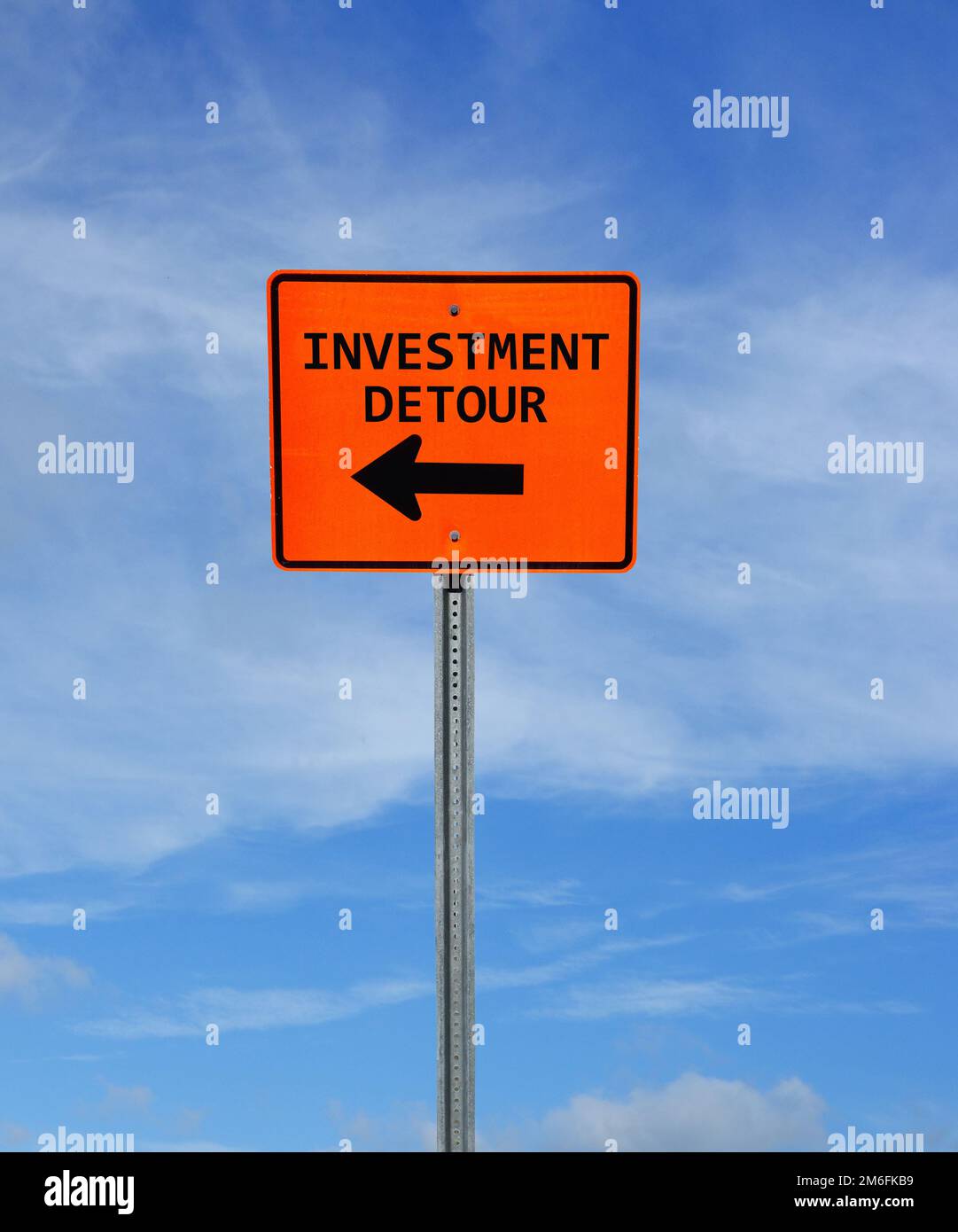 Investment Detour construction sign with arrow and blue sky ...