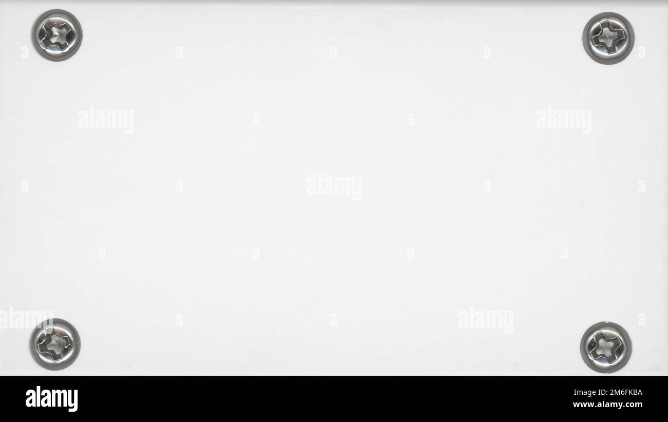 Metal plate with screws Stock Photo - Alamy