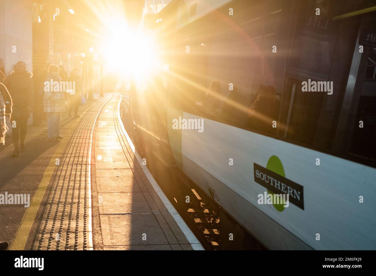 London-December 2022: Southern Train aClapham Junction Station platform ...