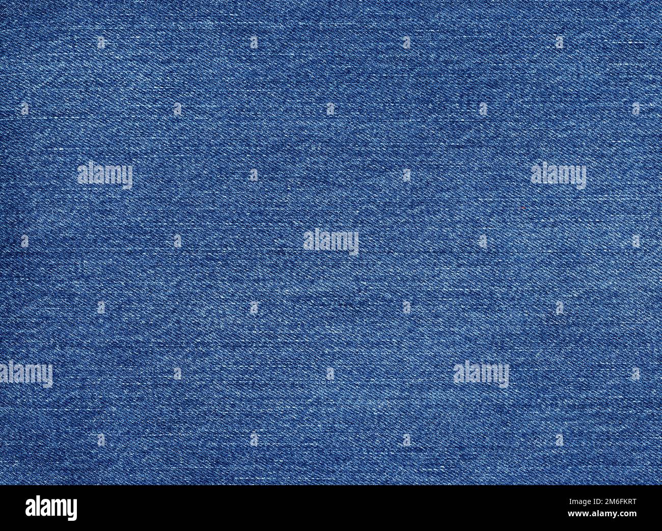 Blue jeans cotton fabric texture background Stock Photo - Alamy