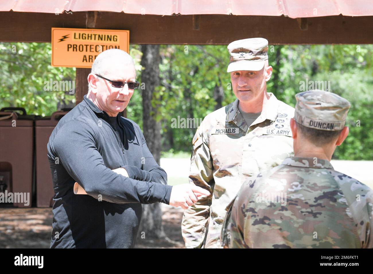 Celebrity Chef Robert Irvine, left, speaks with Brig. Gen. Patrick R ...
