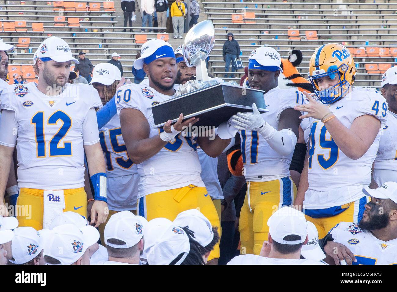 Pitt Panthers players Nick Patti (12) Dayon Hayes (90), Bangally Kamara ...