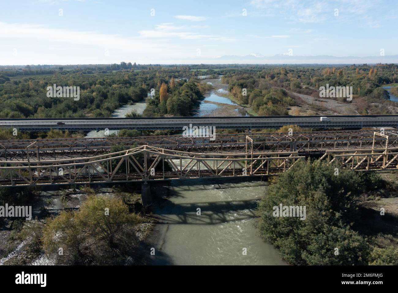 Aerial view of the railroad bridge above a river in Maule region, Chile ...