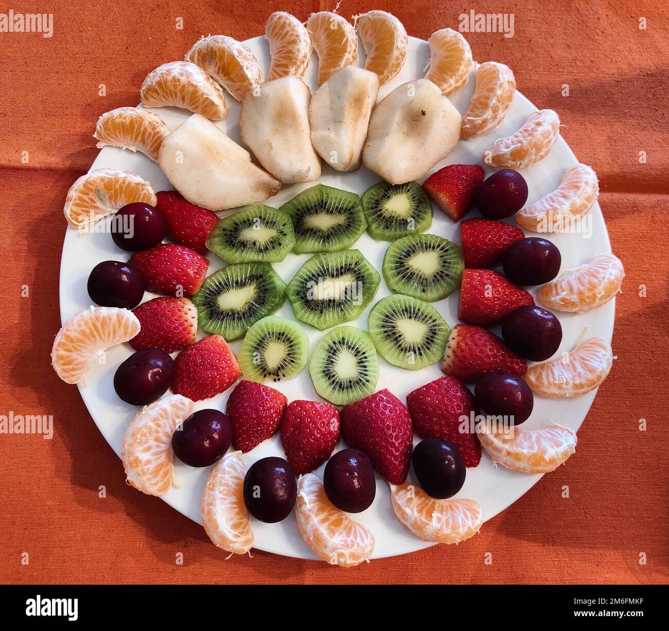 A top view of a plate of fruit salad on the table Stock Photo - Alamy