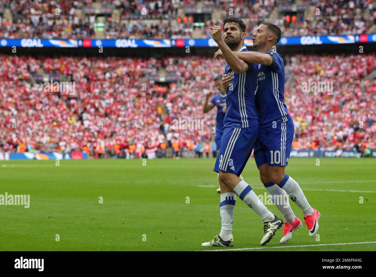 Diego Costa of Chelsea celebrates after scoring the equalising goal ...