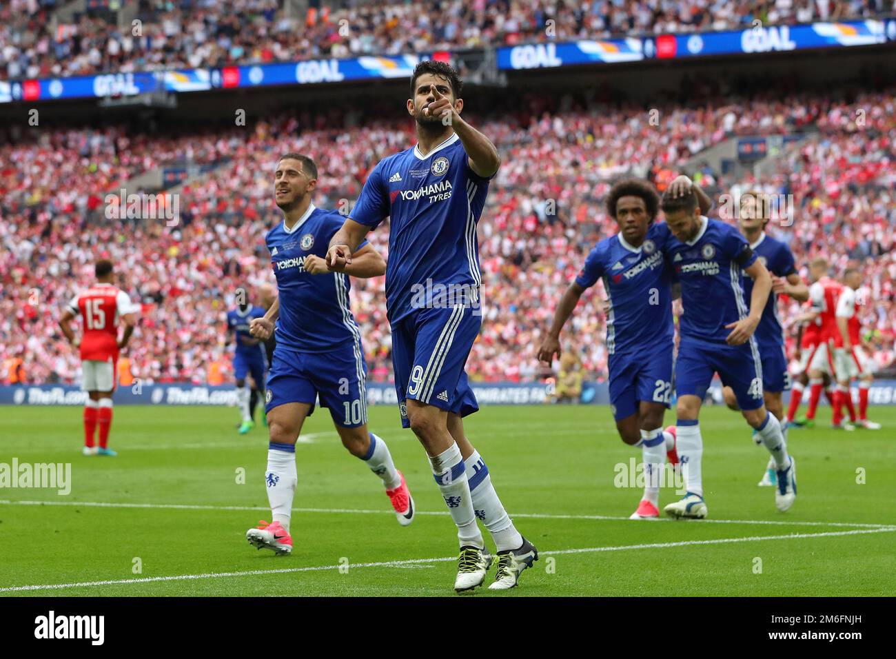 Diego Costa of Chelsea celebrates after scoring the equalising goal ...