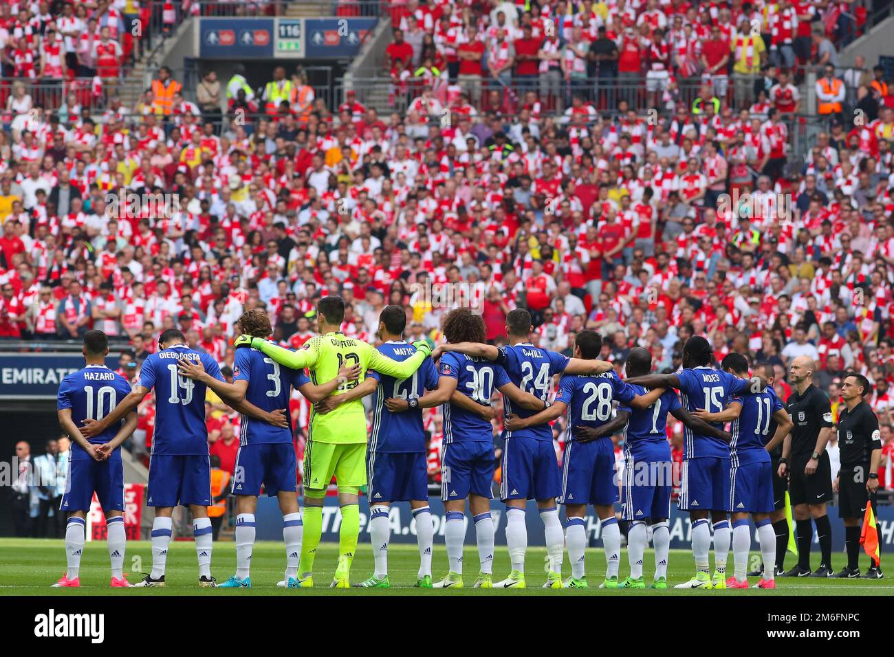 Chelsea players observe a minutes silence in respect of those killed in ...
