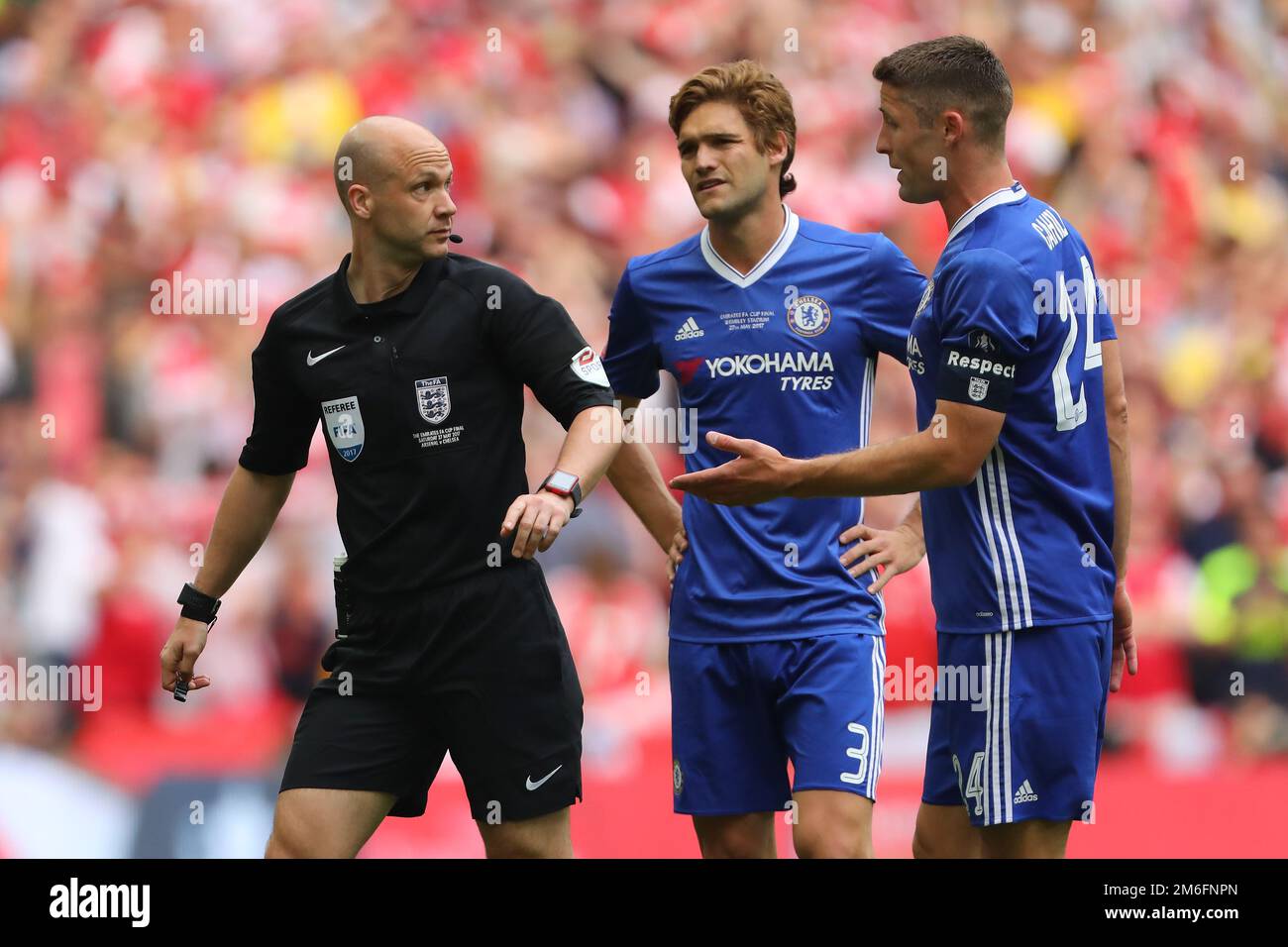 Gary Cahill of Chelsea protests to Referee, Anthony Taylor after ...