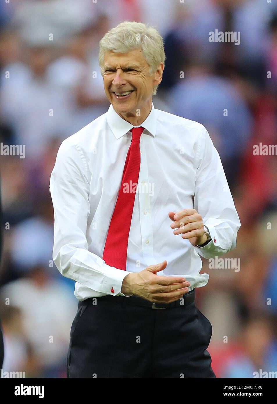 Manager of Arsenal, Arsene Wenger celebrates after beating Chelsea 2-1 ...
