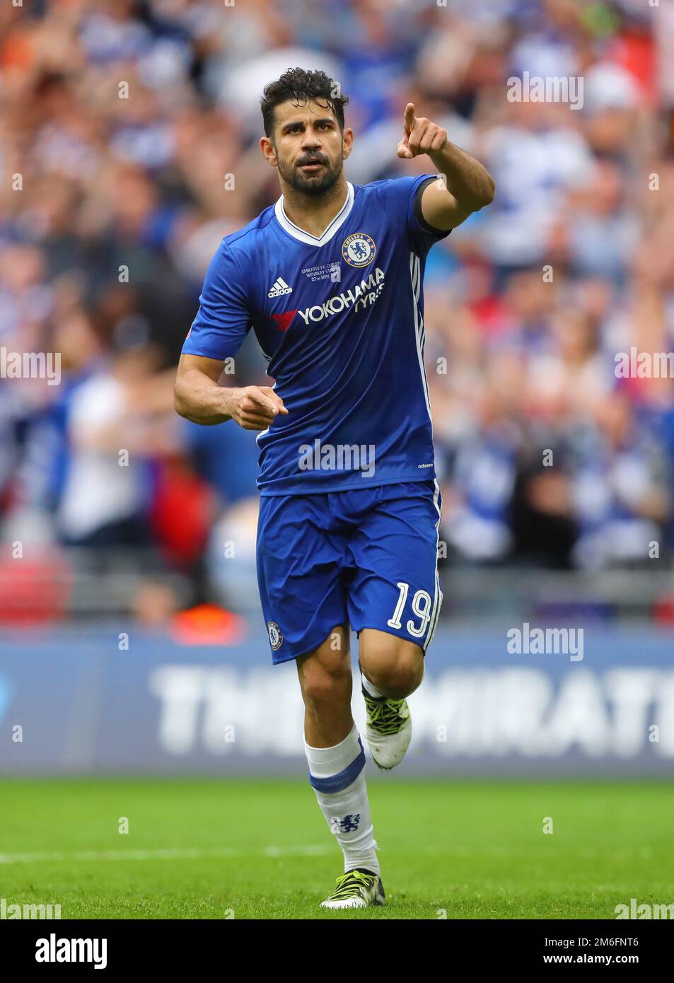 Diego Costa of Chelsea celebrates after scoring the equalising goal ...