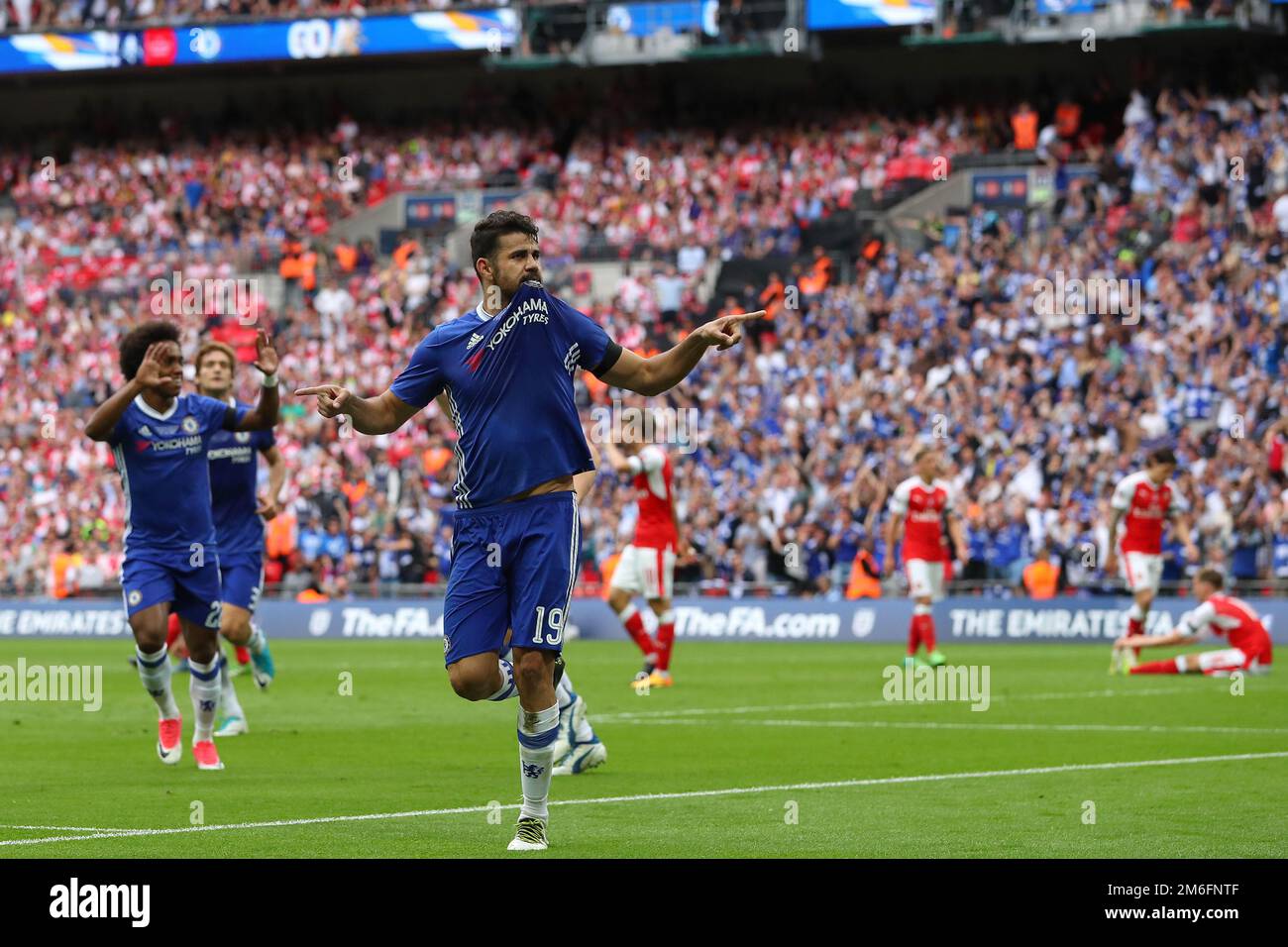 Diego Costa of Chelsea celebrates after scoring the equalising goal ...
