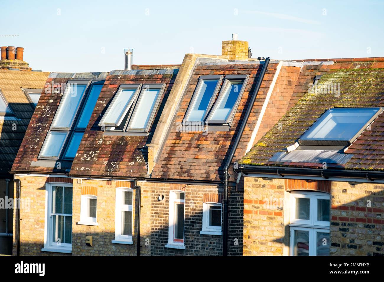 UK- Houses with windows in roof living space in south west London Stock ...